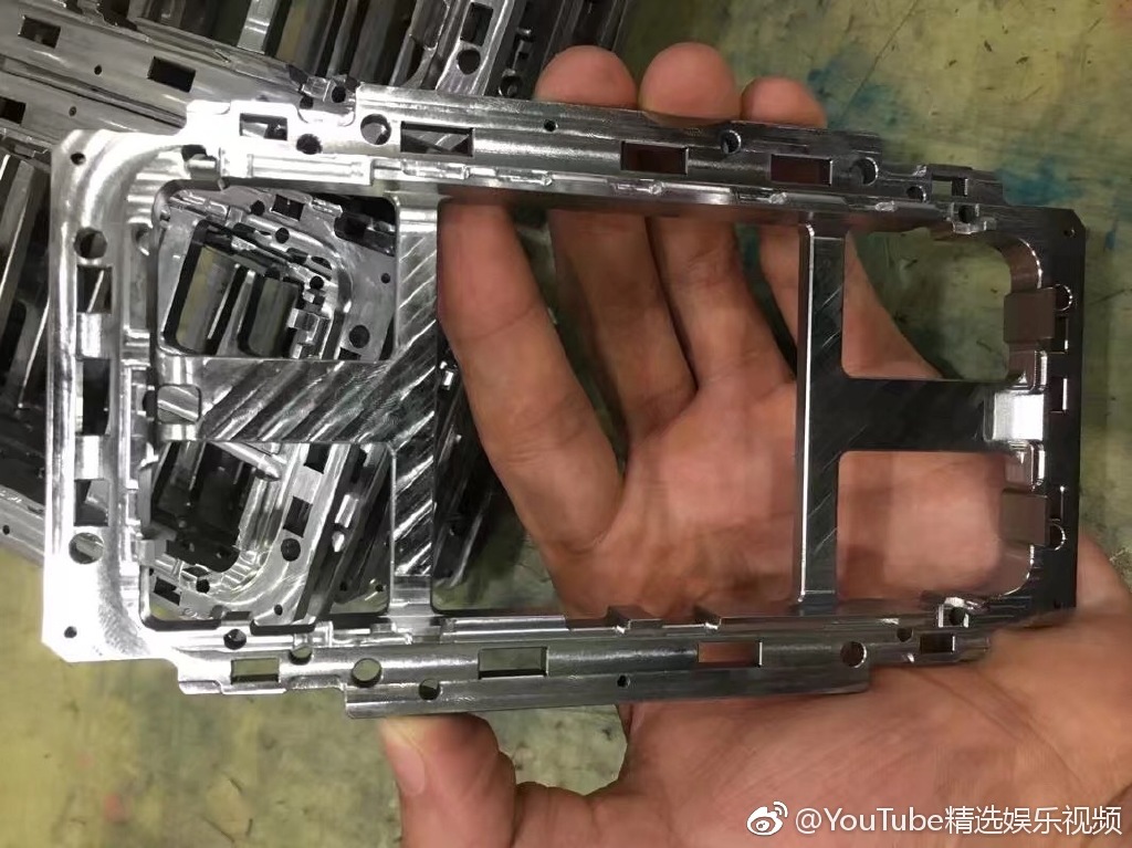 หลุดภาพถ่าย คาดว่าเป็นอุปกรณ์ตัวจับยึด (Shell Fixture) ผลิตกรอบโลหะ ...